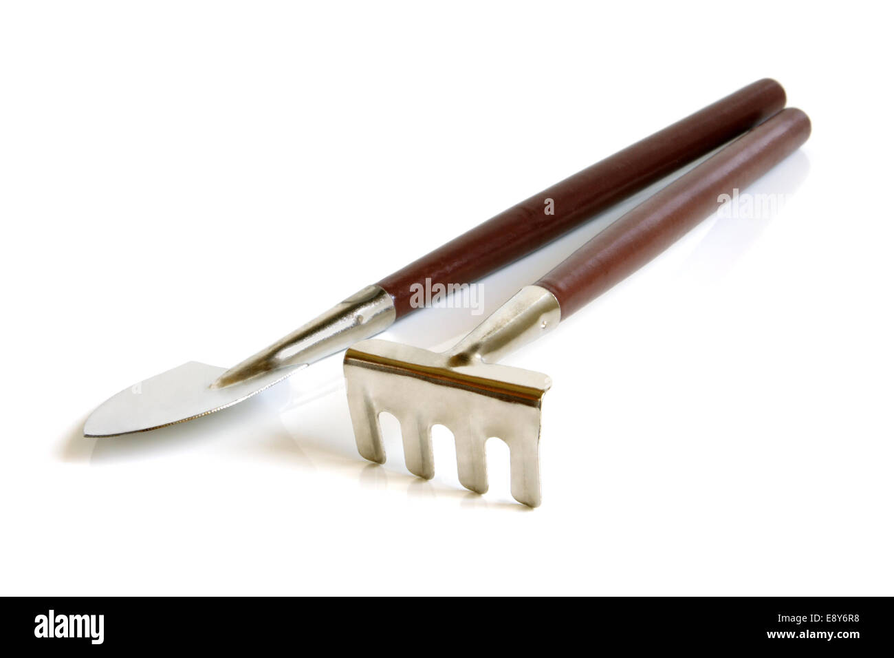 Shovel and rake Stock Photo - Alamy