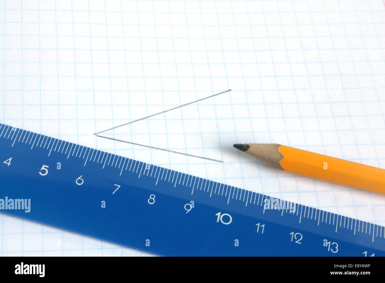Pencil and ruler on a school writing-book Stock Photo - Alamy