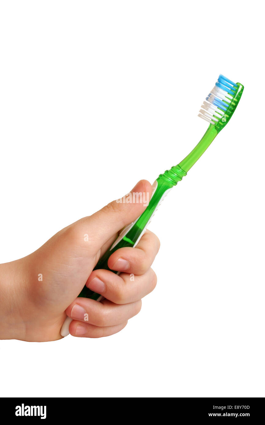 Tooth-brush in a hand Stock Photo - Alamy