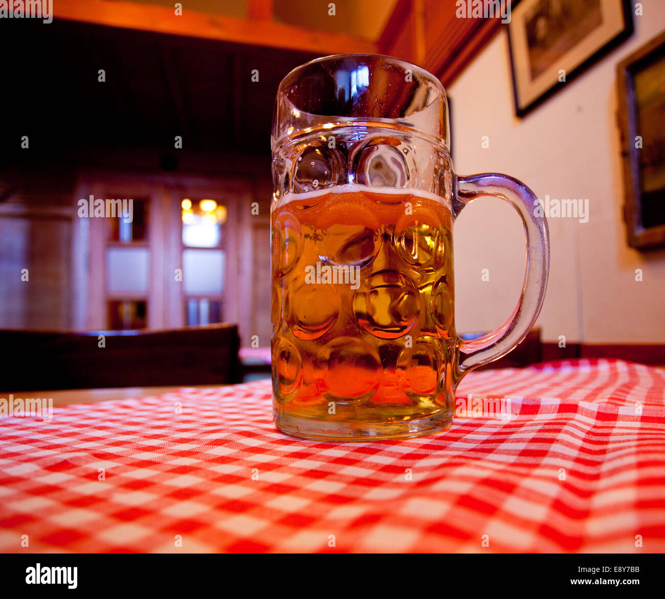 Liter glass of beer in hand Stock Photo - Alamy