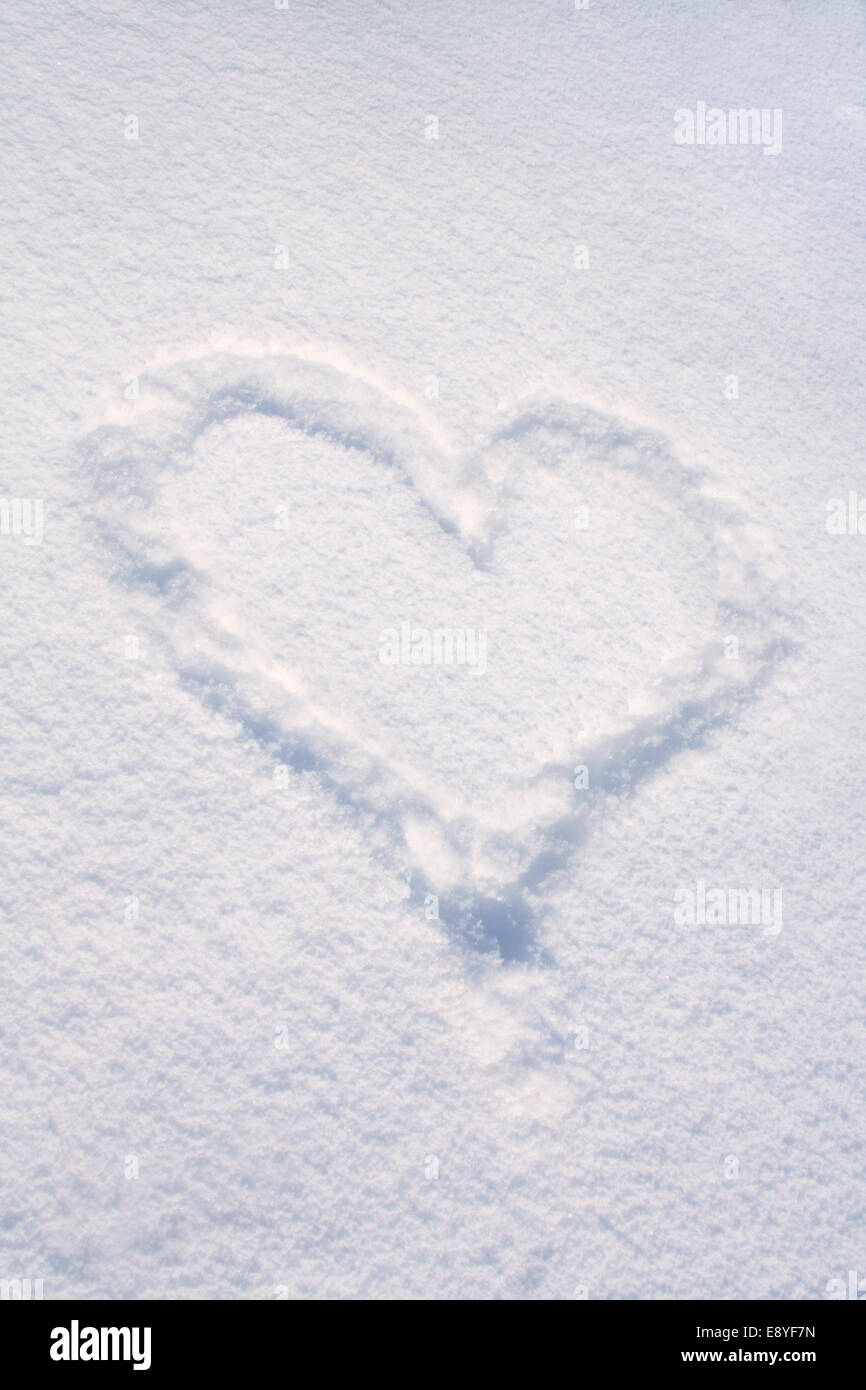 Heart drawn on the fresh snow Stock Photo - Alamy