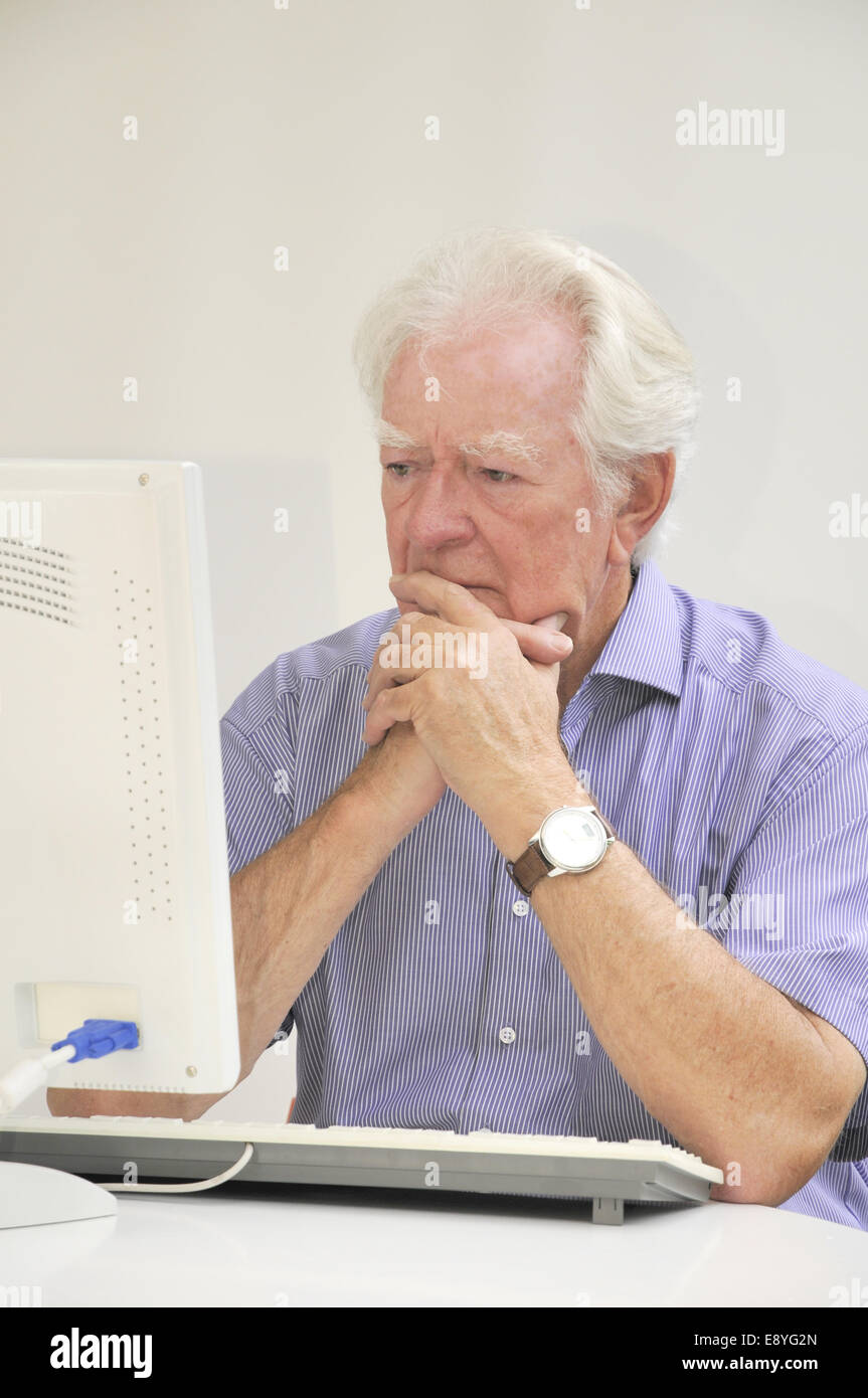 Senior at the computer Stock Photo - Alamy