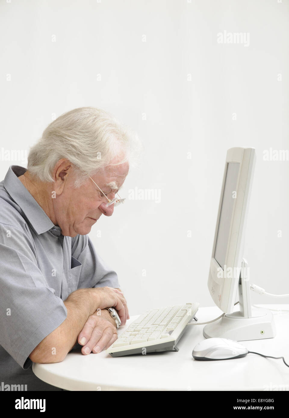 Senior with computer Stock Photo - Alamy