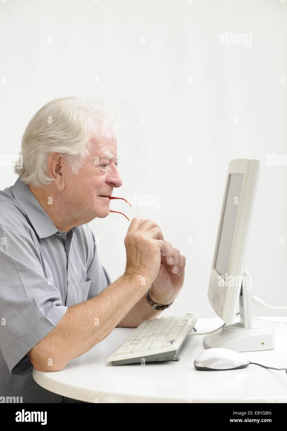 Senior with computer Stock Photo - Alamy