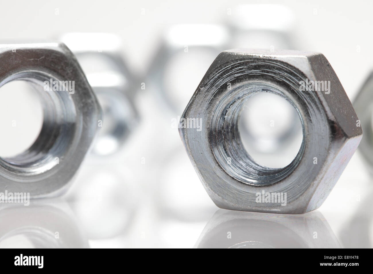 Metal nuts, closeup Stock Photo - Alamy