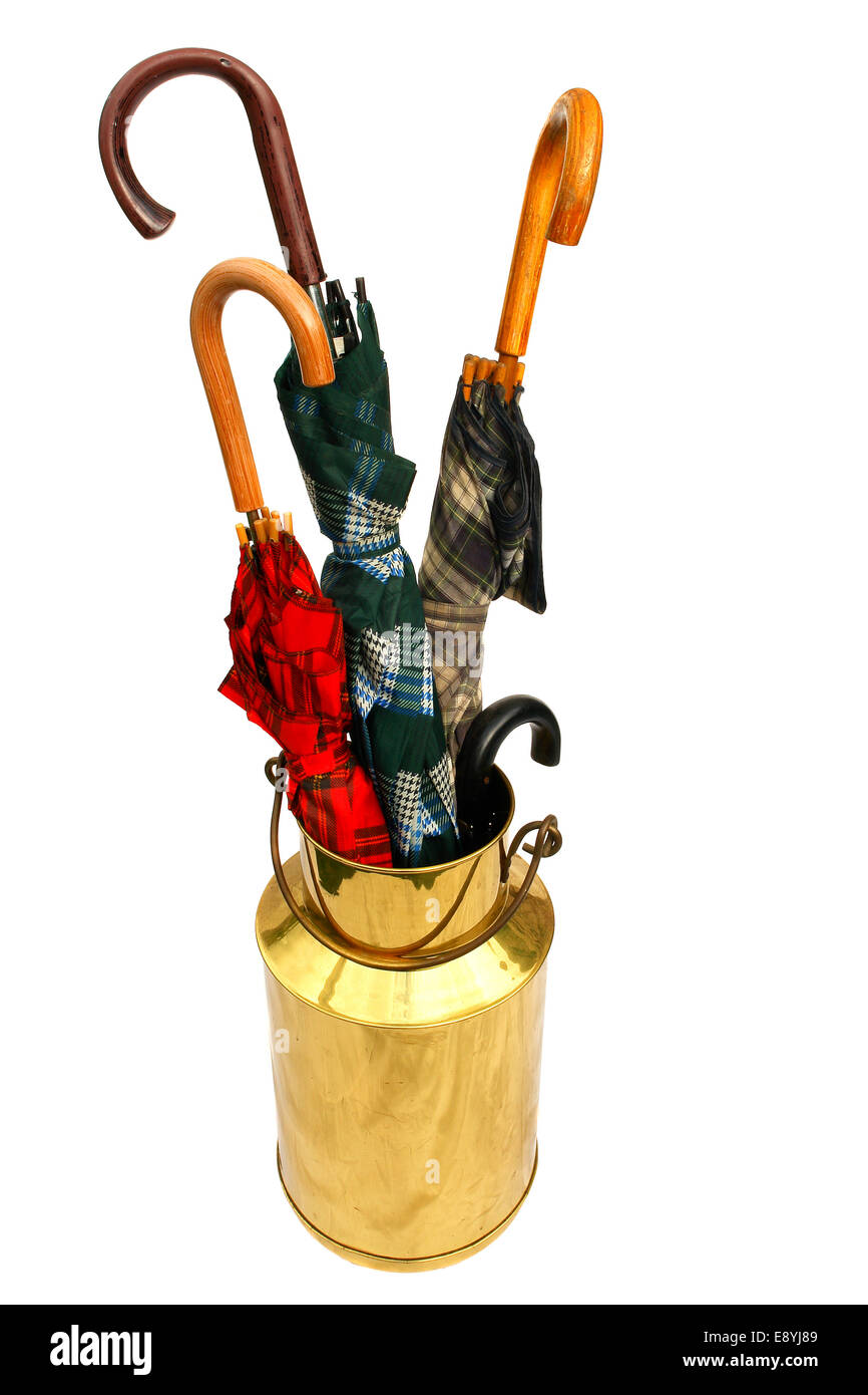 Umbrellas in bucket Stock Photo - Alamy