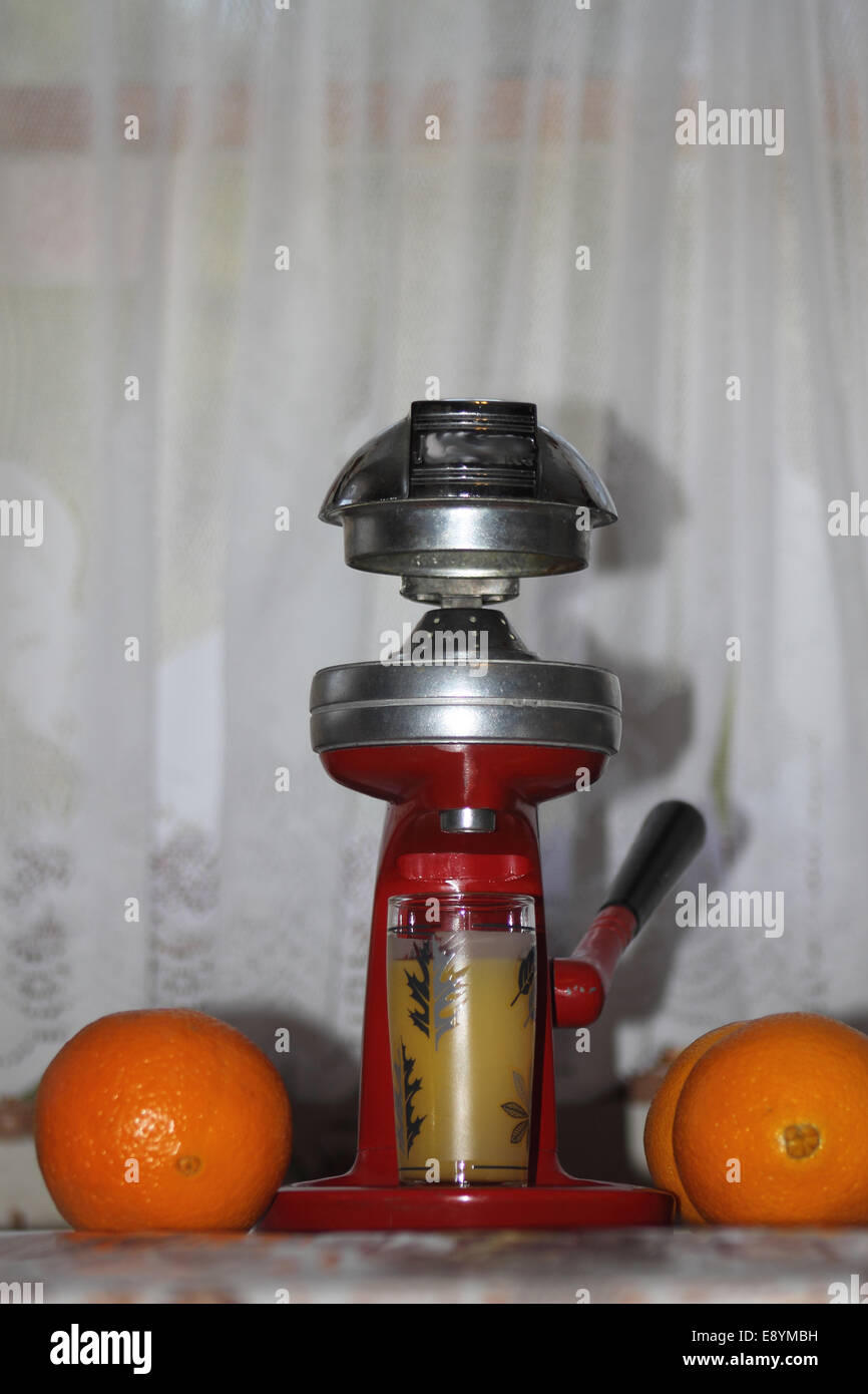 Old fashioned juicer Stock Photo - Alamy