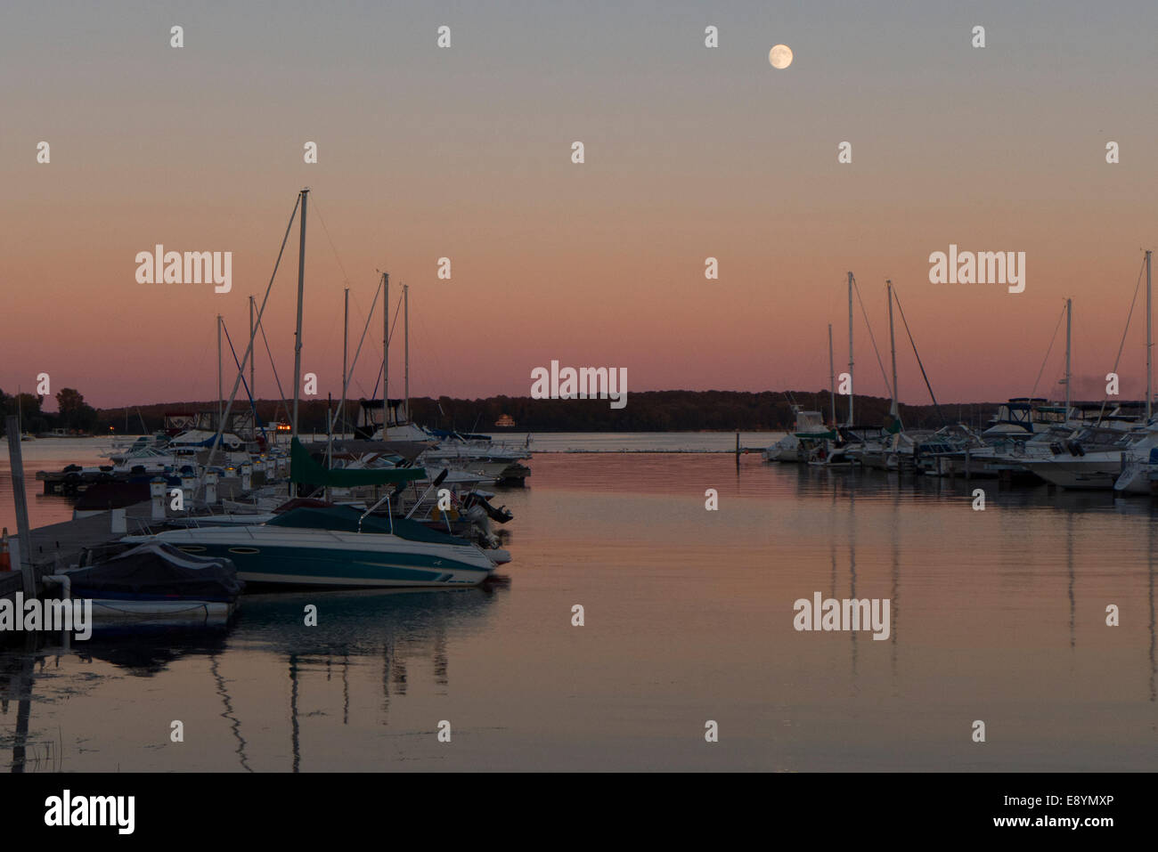 Moon over bay at dusk hi-res stock photography and images - Alamy
