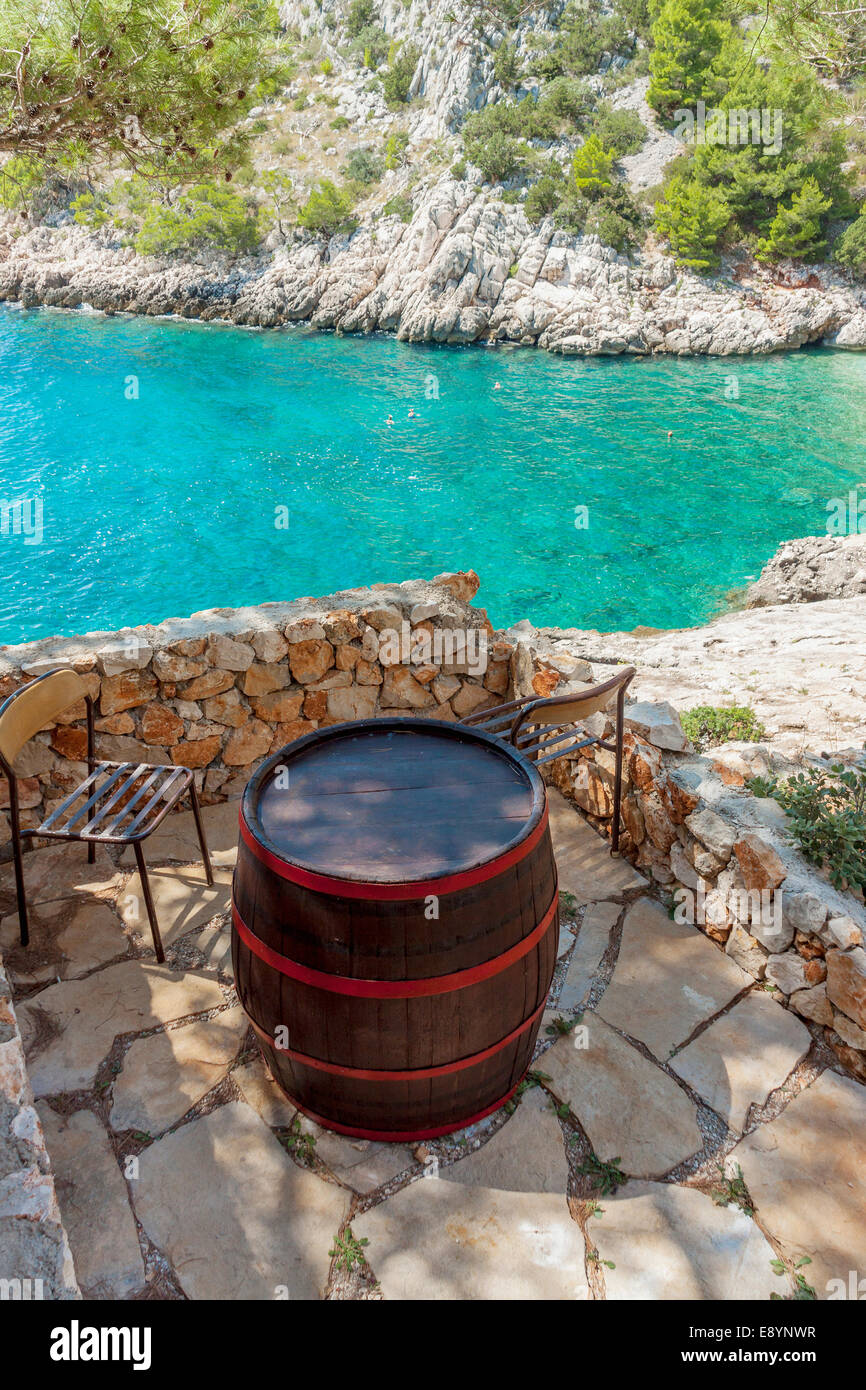 Barrel serving as table and chairs in Lucisca bay near Sveta Nedilja ...