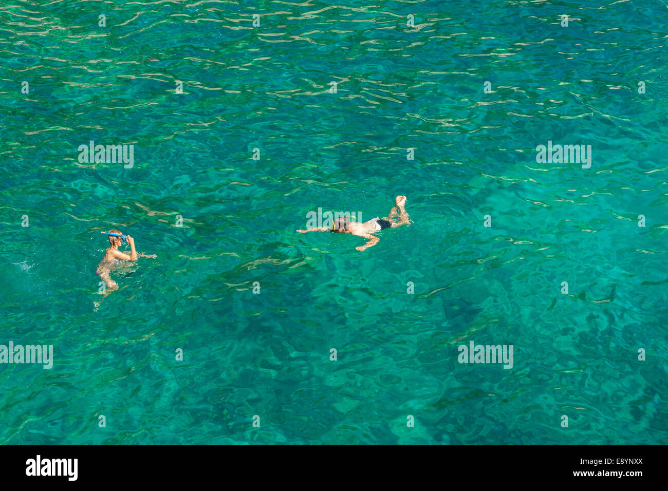 Tourists swimming in Lucisca bay near Sveta Nedilja village, Hvar ...