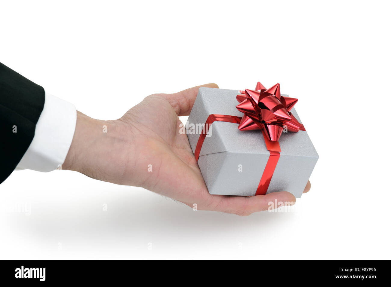 dressed man who offers a gift box Stock Photo - Alamy