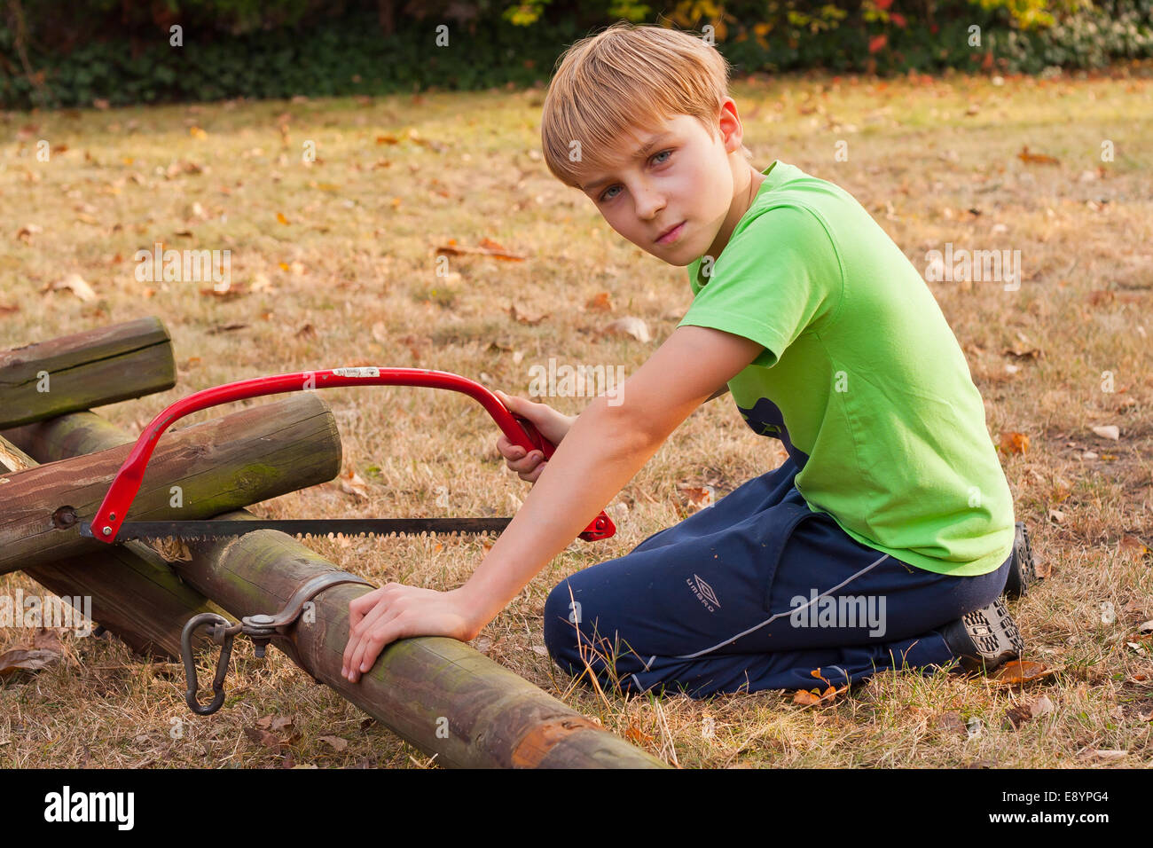 Boy cutting grass hi-res stock photography and images - Alamy