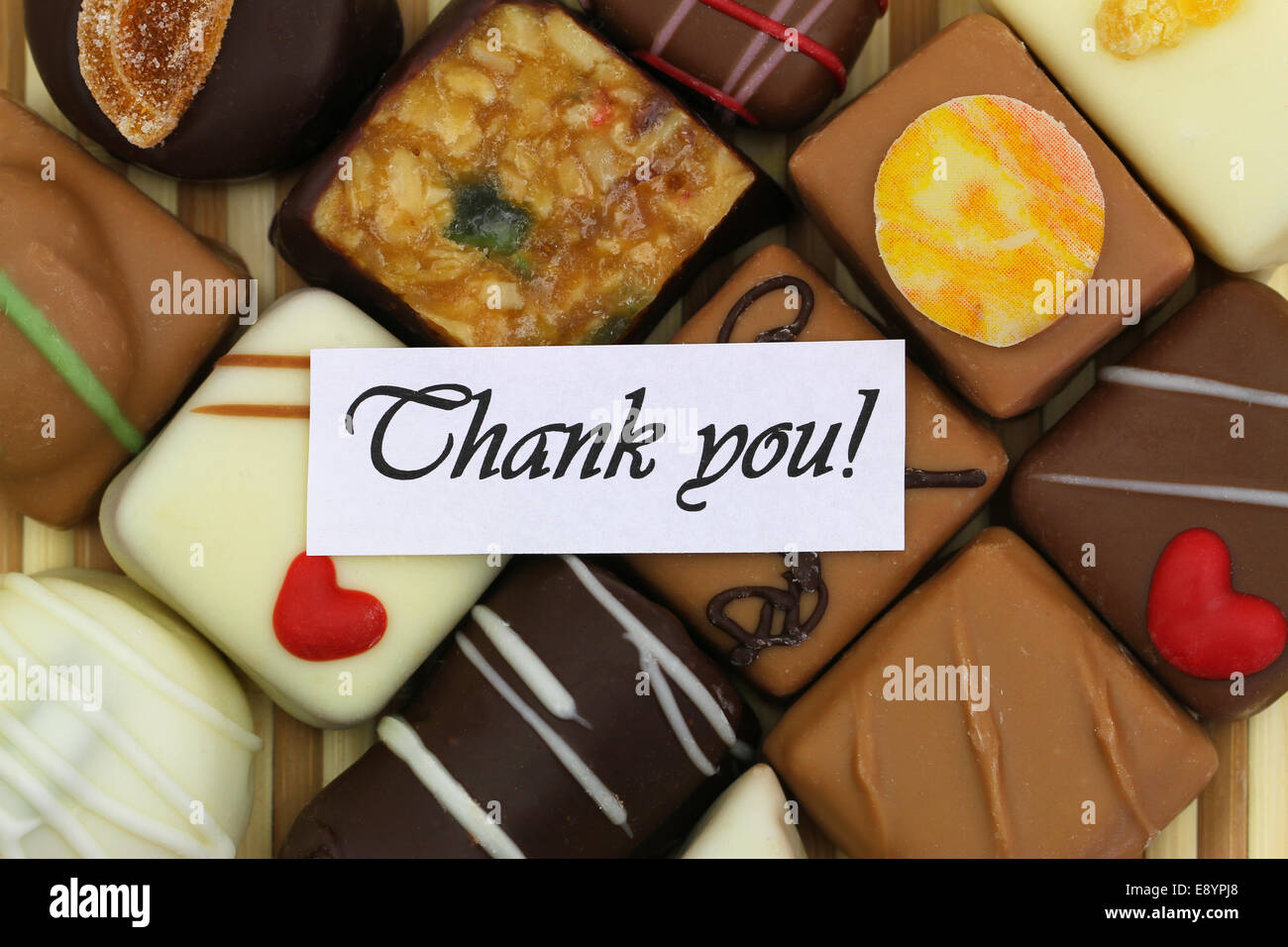 Thank you card with assorted chocolates Stock Photo - Alamy
