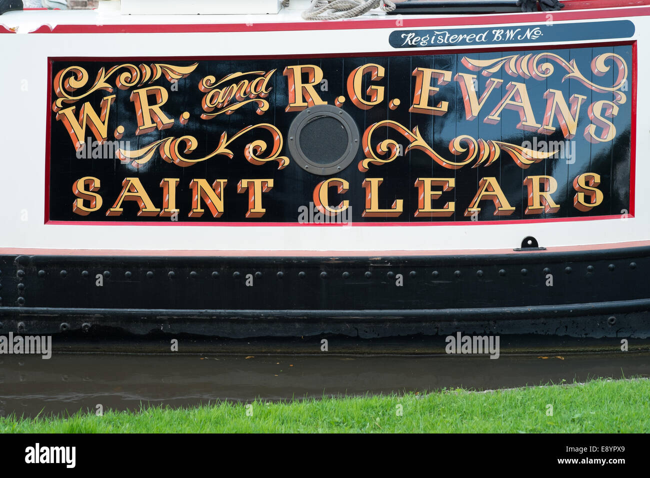 Hand painted lettering on a canal boat on the Trent and Mersey Canal ...