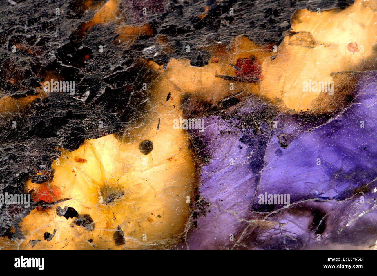 Iolite / blue cordierite crystals, backlit Stock Photo - Alamy