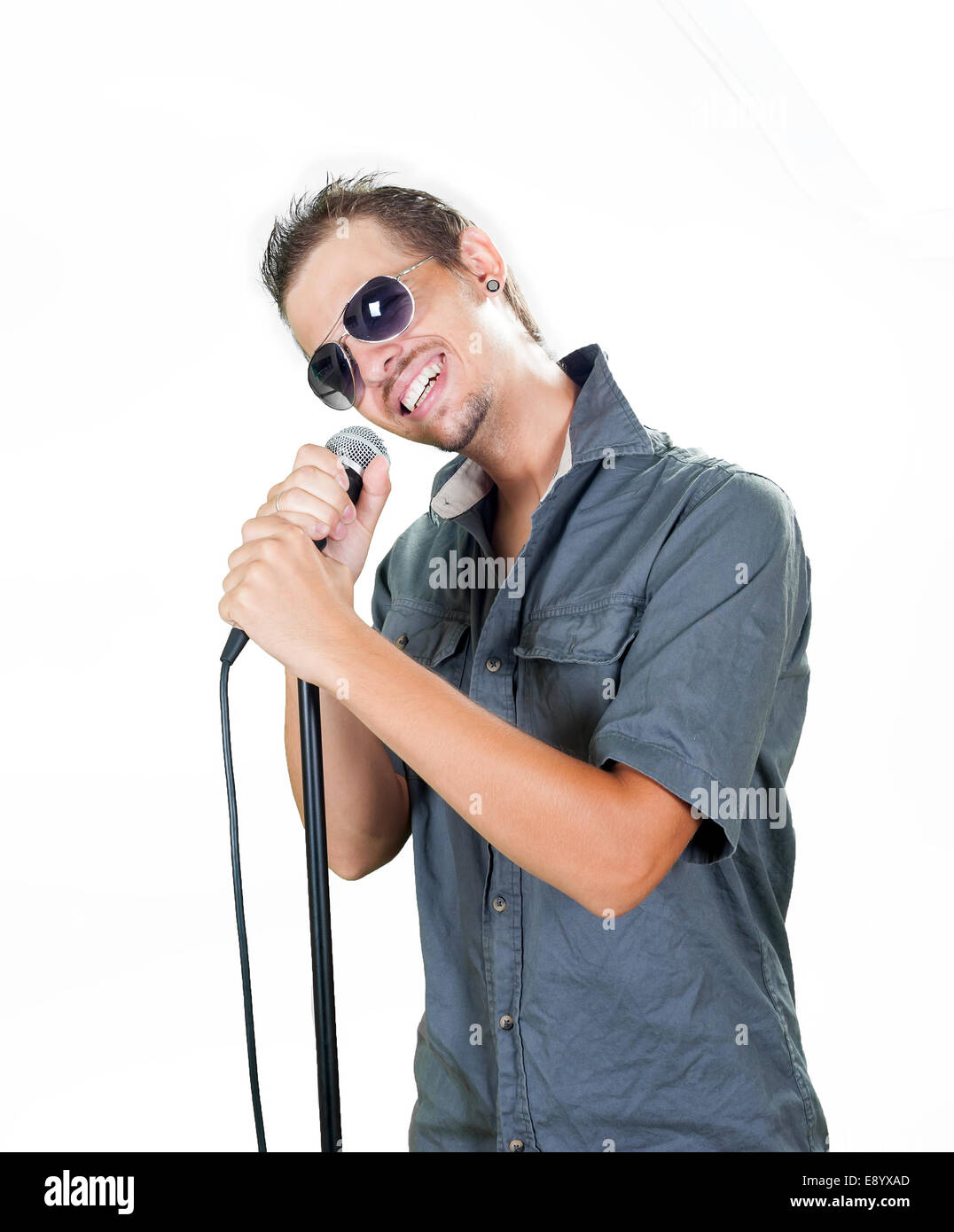 Young european singer on the white background Stock Photo - Alamy