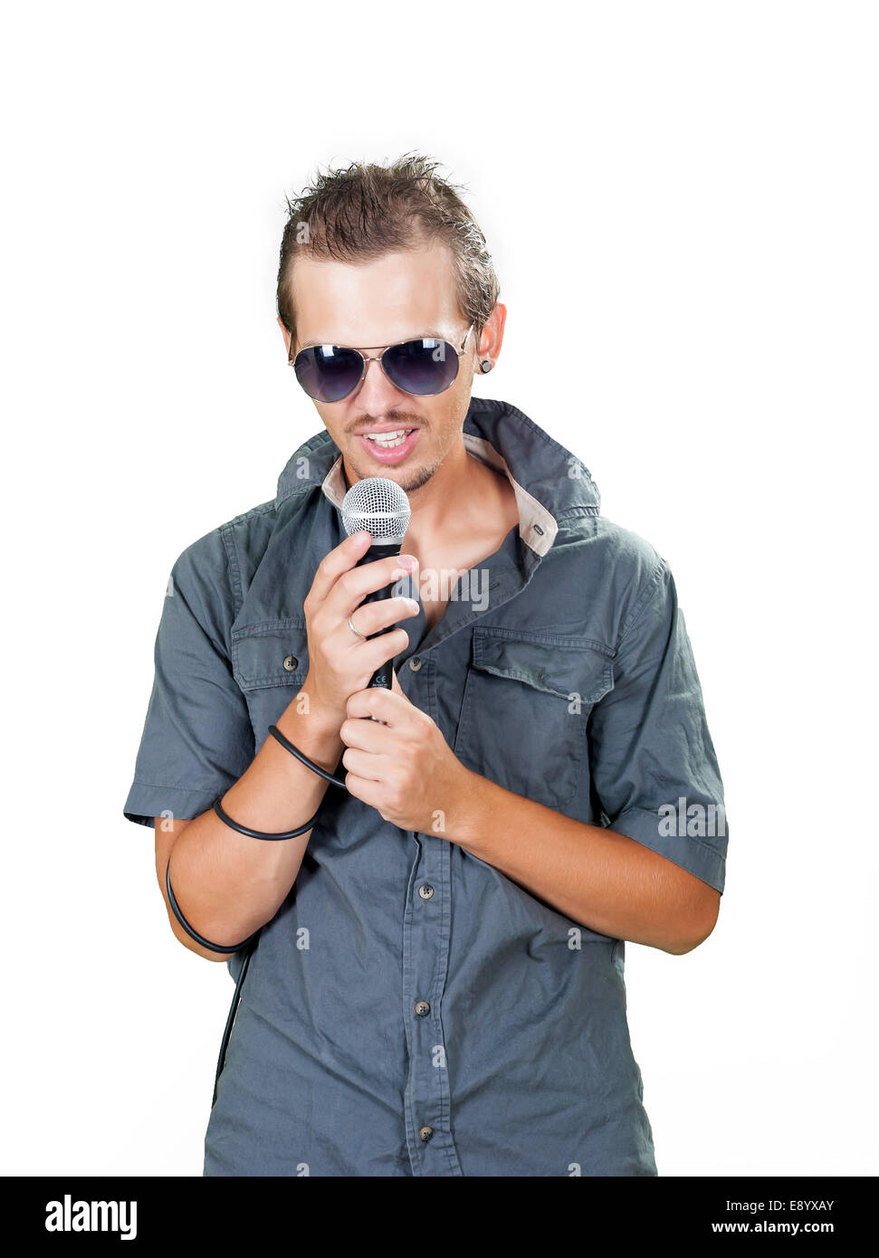 Young european singer wearing sunglasses on the white background Stock ...