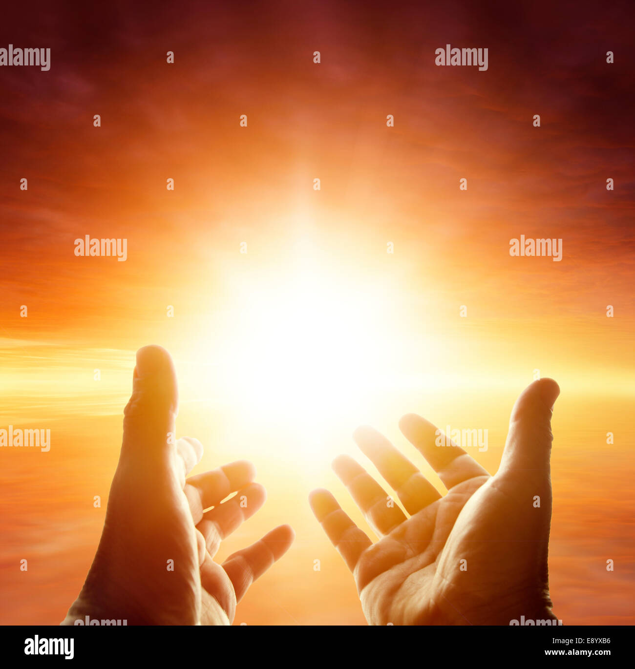 Hands reaching for the sky Stock Photo - Alamy