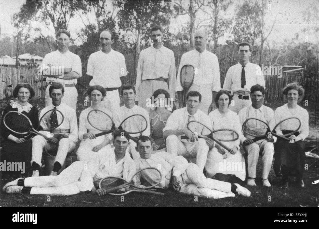 This photograph shows the Nanango tennis team from 1918, capturing the ...