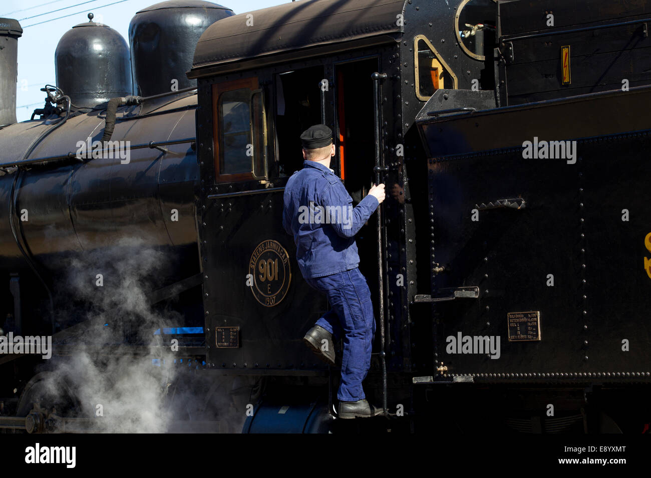 Driver climbs up on an old Swedish steam locomotive Stock Photo - Alamy Driver climbs up on an old Swedish steam locomotive Stock Photo - Alamy