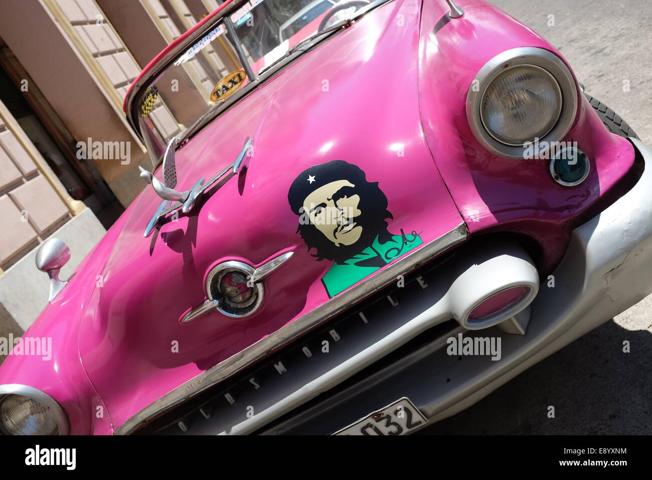 Brightly coloured Oldsmobile convertible in Havana, Cuba Stock Photo ...