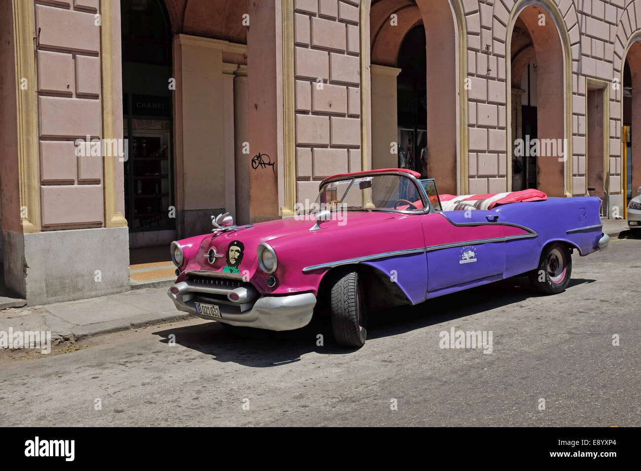 Brightly coloured Oldsmobile convertible in Havana, Cuba Stock Photo ...