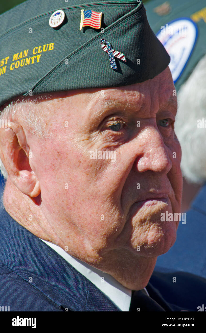 A World War II Veteran gives his attention during a speech dedicating a ...
