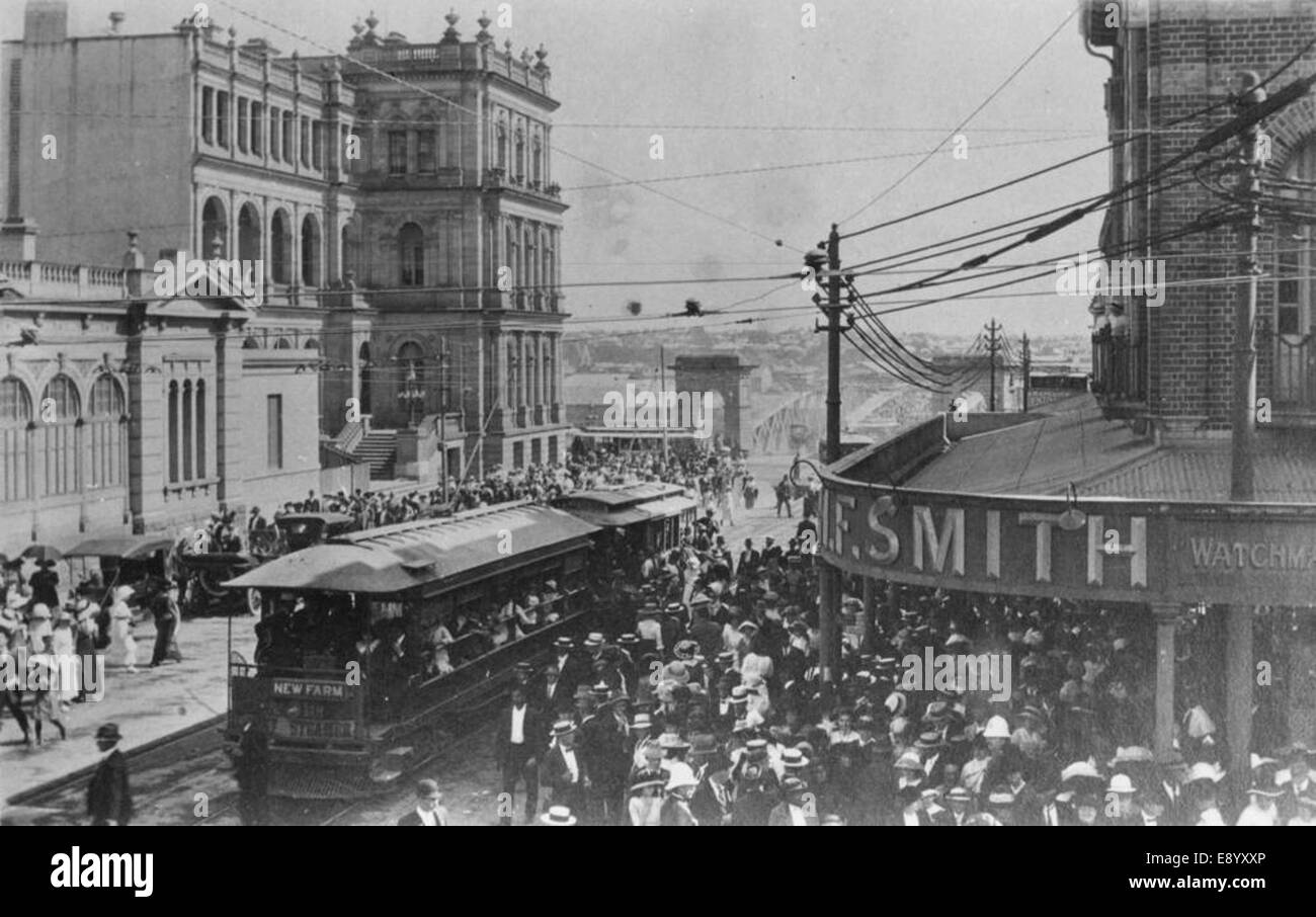 A large crowd of people gathered in the streets of Brisbane, Australia ...