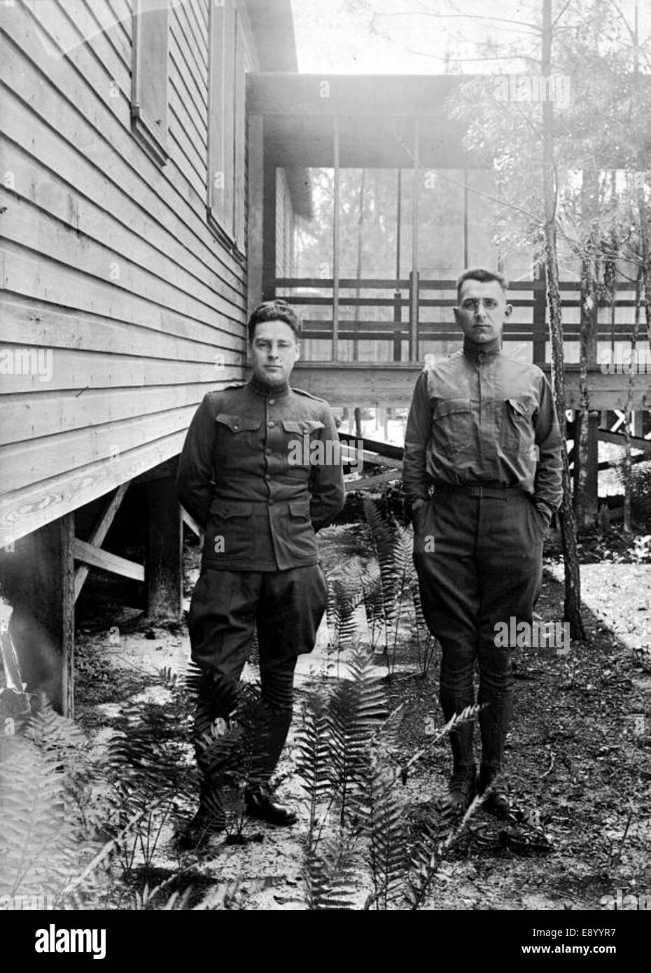 A photograph depicting a pair of soldiers at Camp Joseph E. Johnston ...