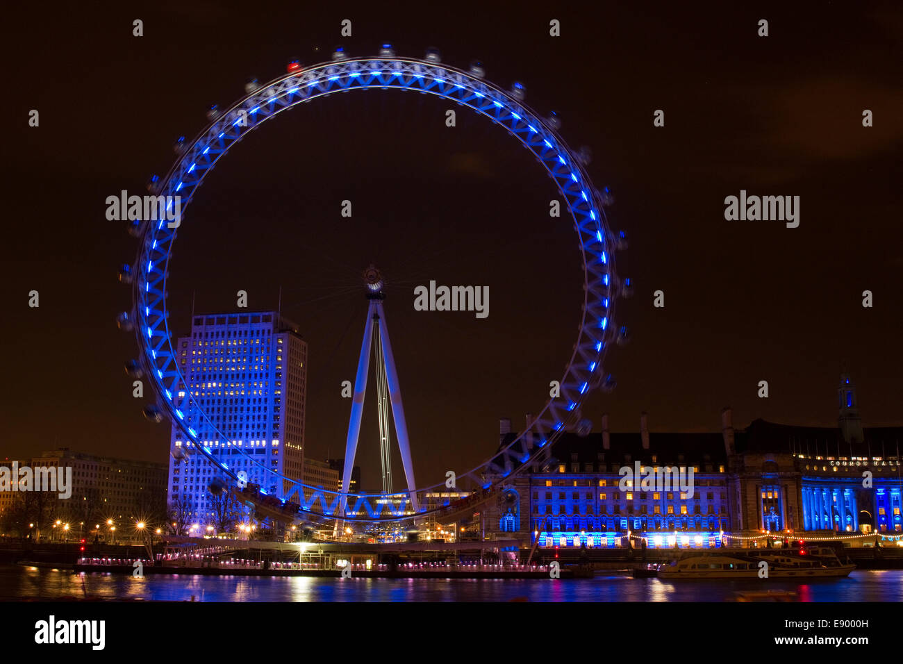 This image shows the London Eye, a giant Ferris Wheel on the South Bank ...