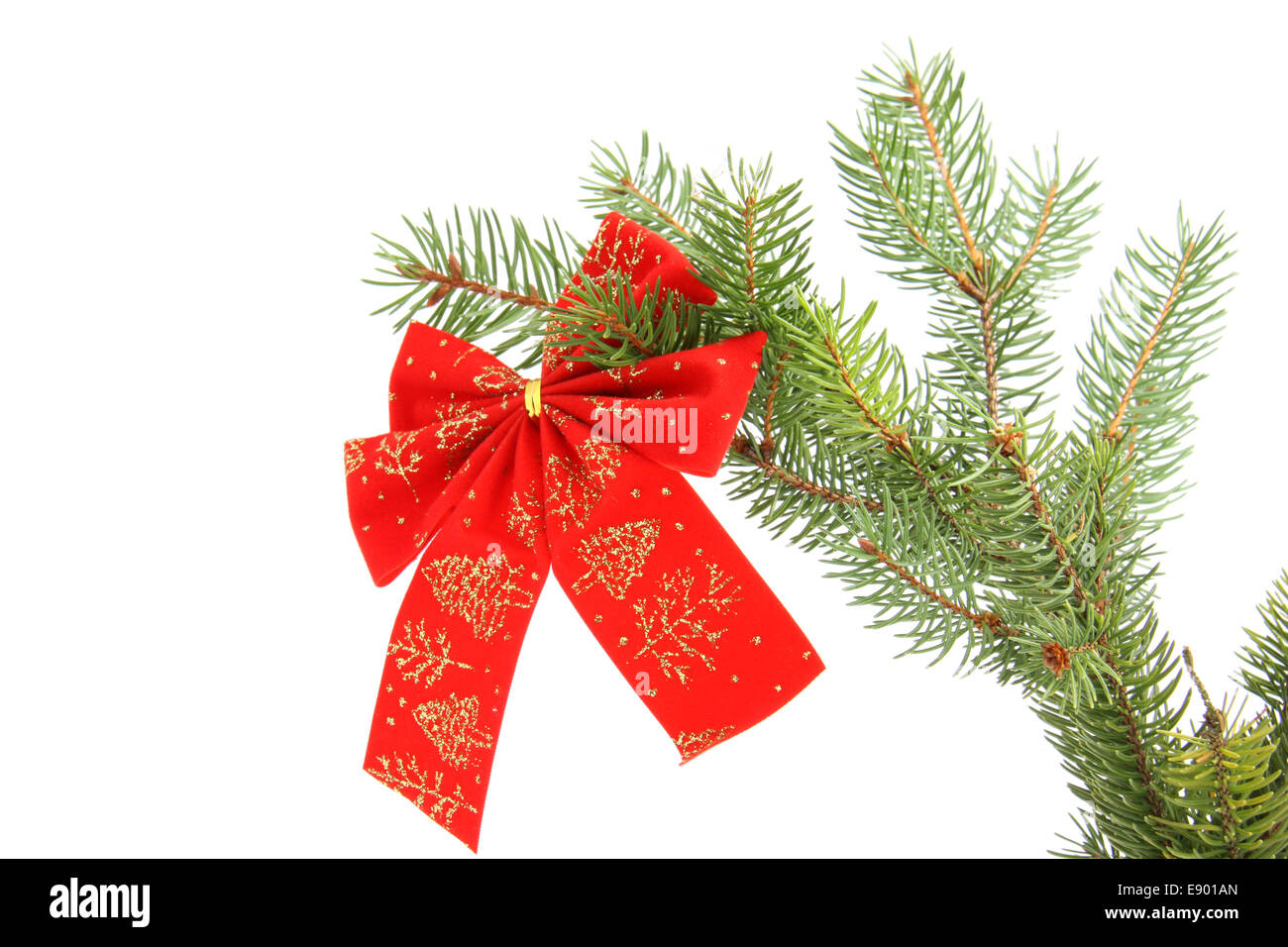 Red christmas ribbon on a tree Stock Photo - Alamy