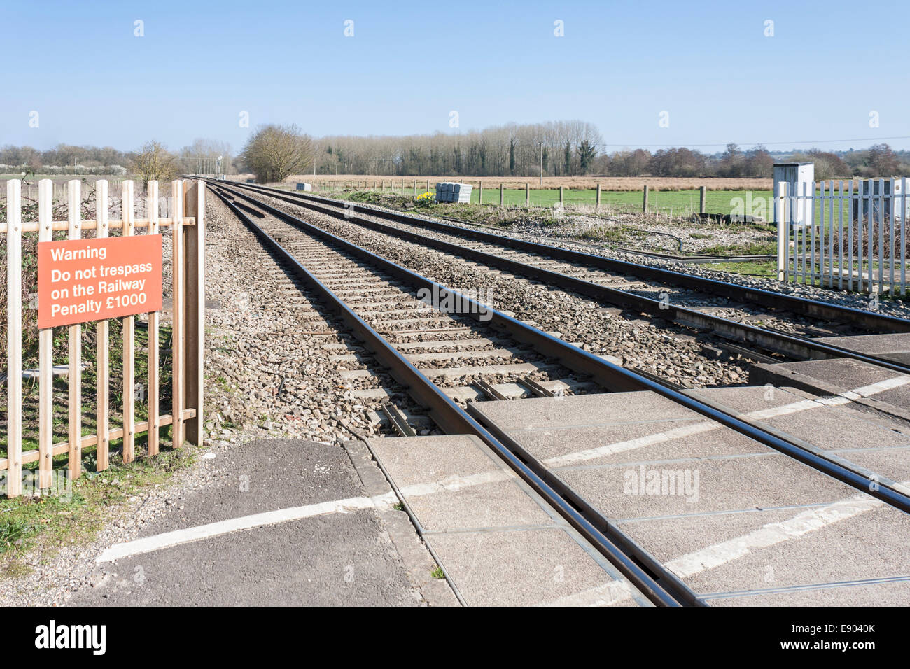 Railway track at the level crossing at Ufton Nervet, Berkshire, England ...