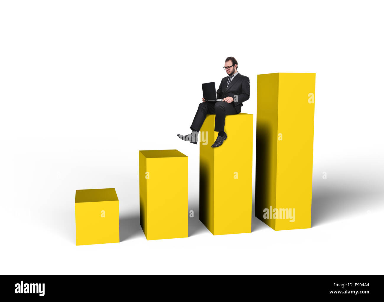 businessman sitting on big graph with laptop Stock Photo - Alamy