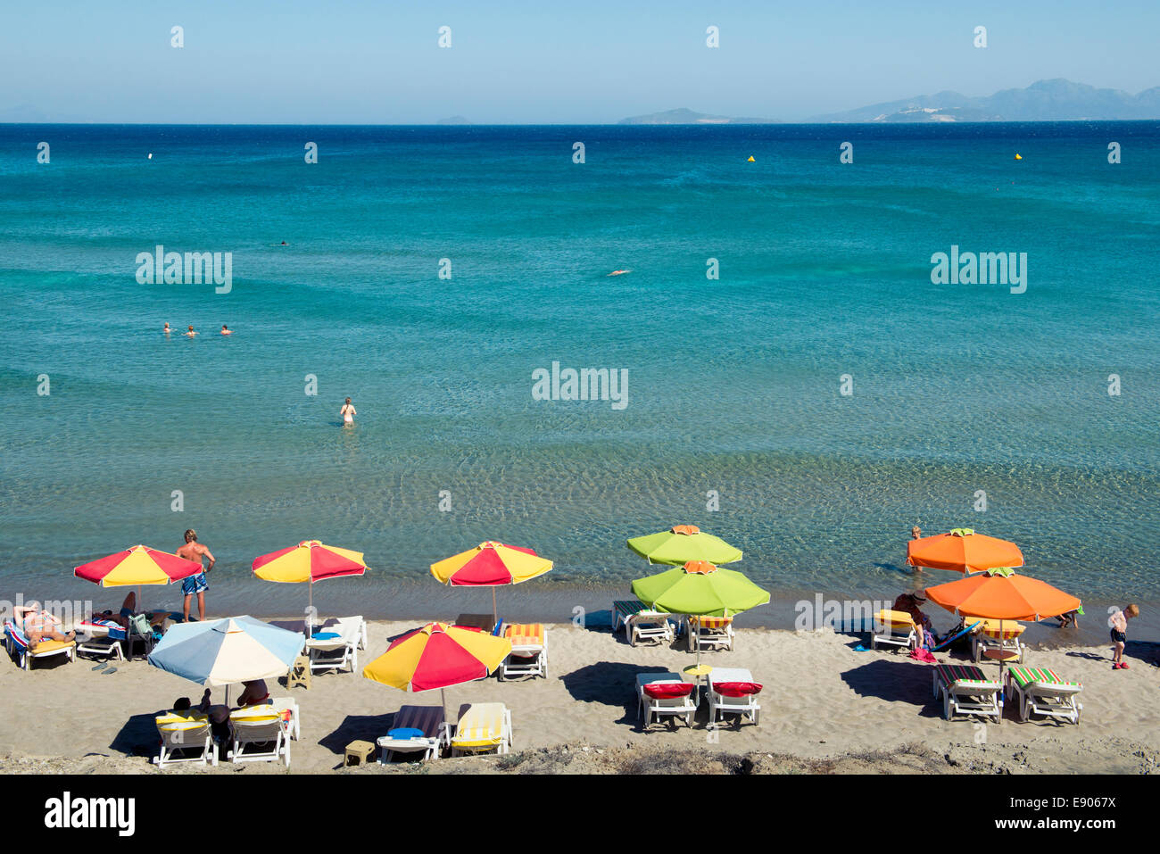 Parasols at Paradise Beach at Kefalos Bay, Kefalos, Kos, Greece Stock ...