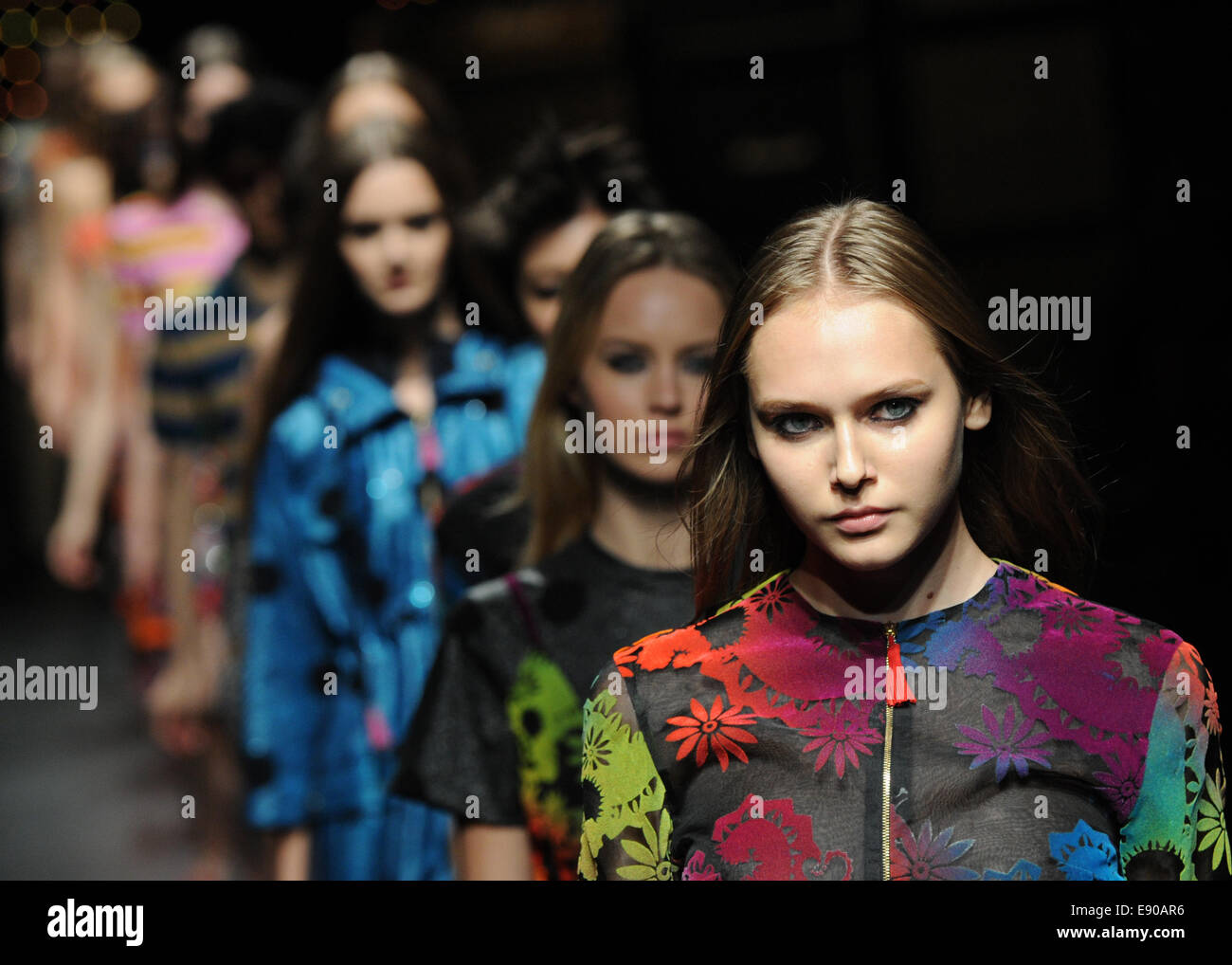 Tokyo, Japan. 16th Oct, 2014. Models display creations designed by ...