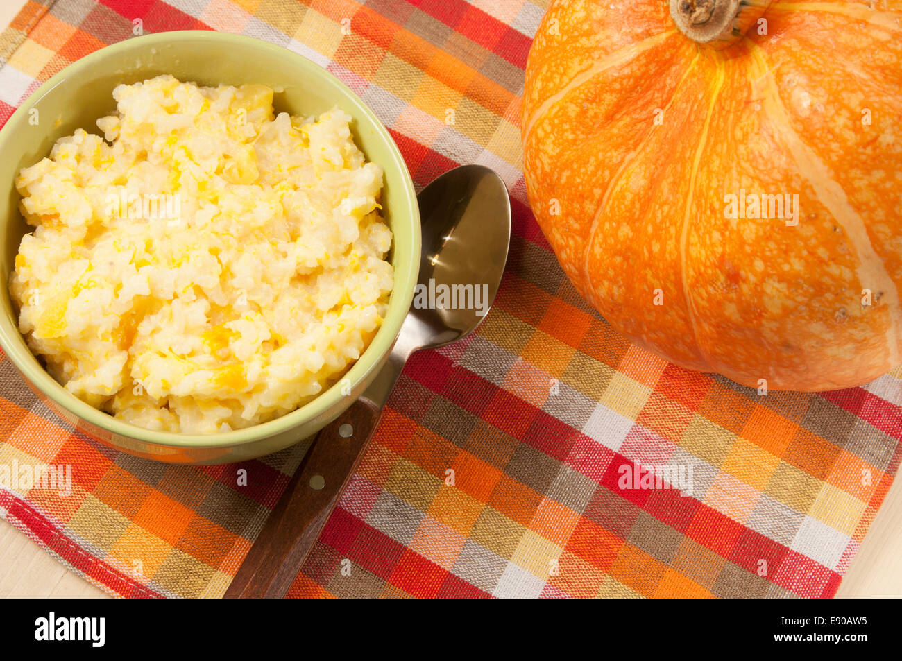 Rice kasha with pumpkin in a ceramic bowl Stock Photo - Alamy