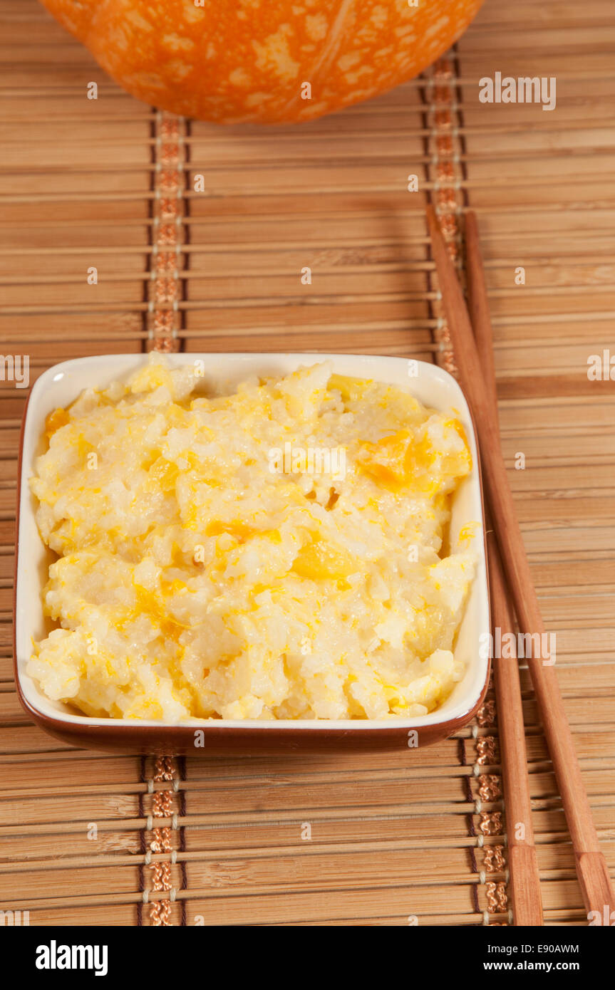Rice kasha with pumpkin in a ceramic bowl Stock Photo - Alamy