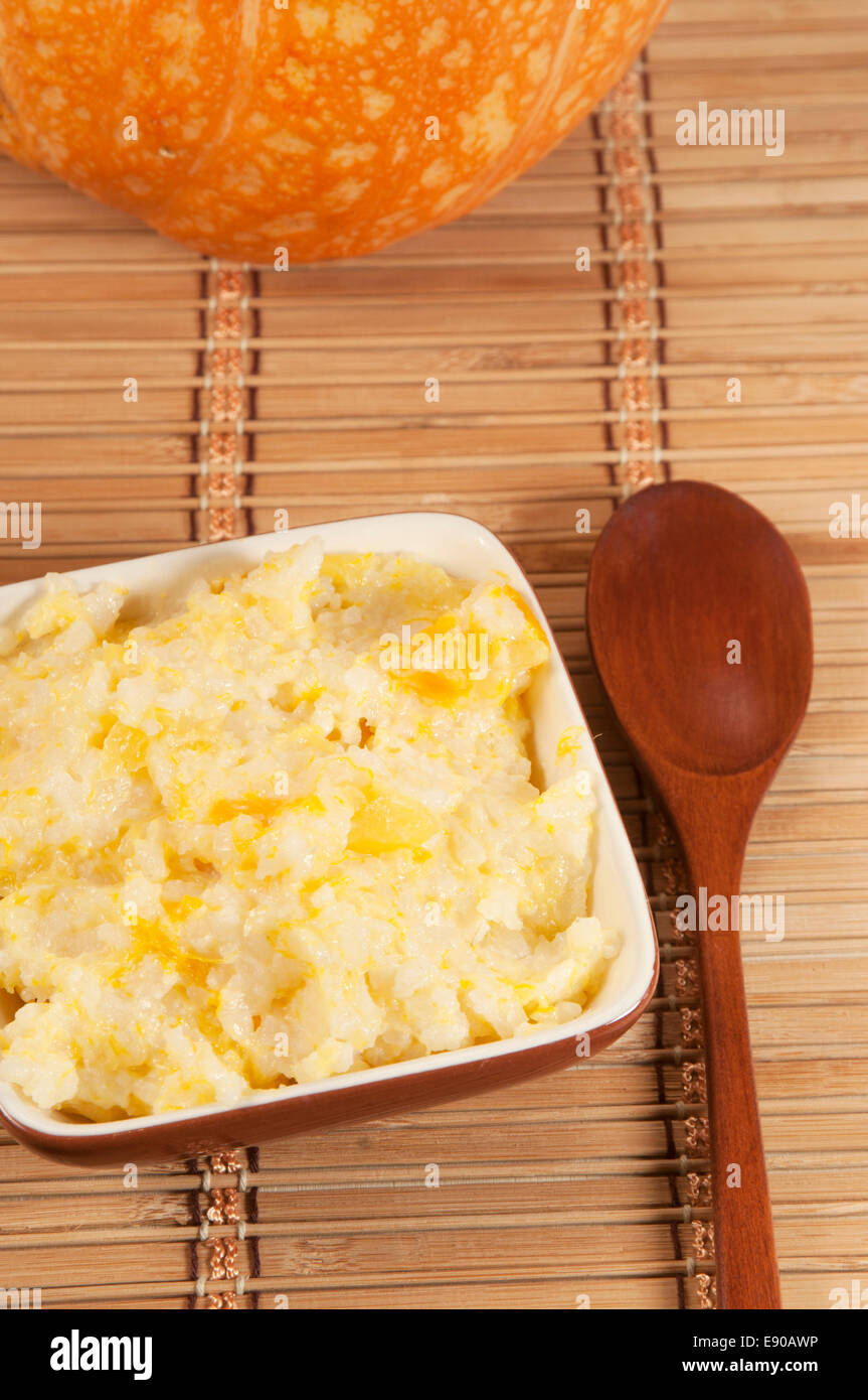 Rice kasha with pumpkin in a ceramic bowl Stock Photo - Alamy