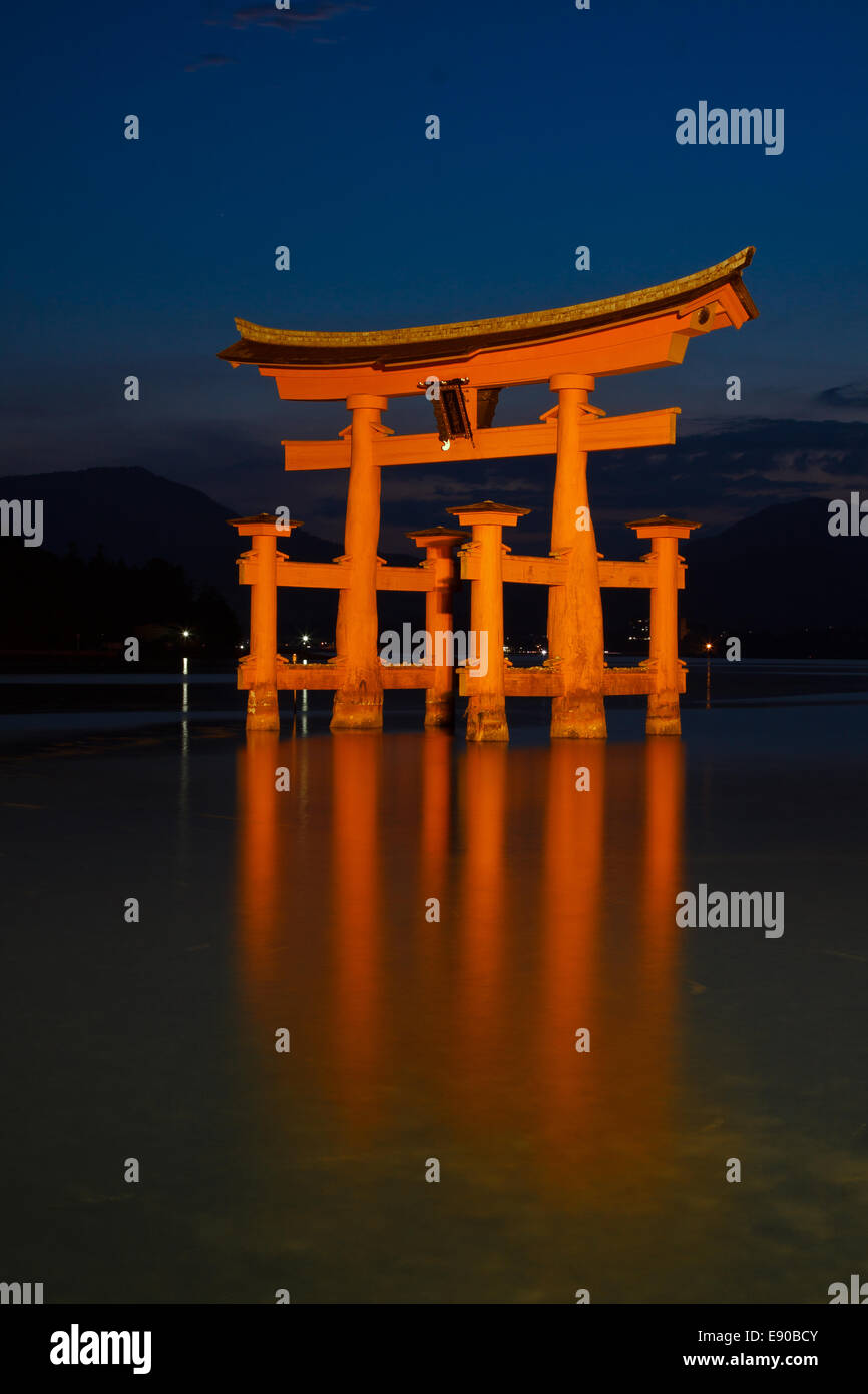 Miyajima torii at night Stock Photo - Alamy