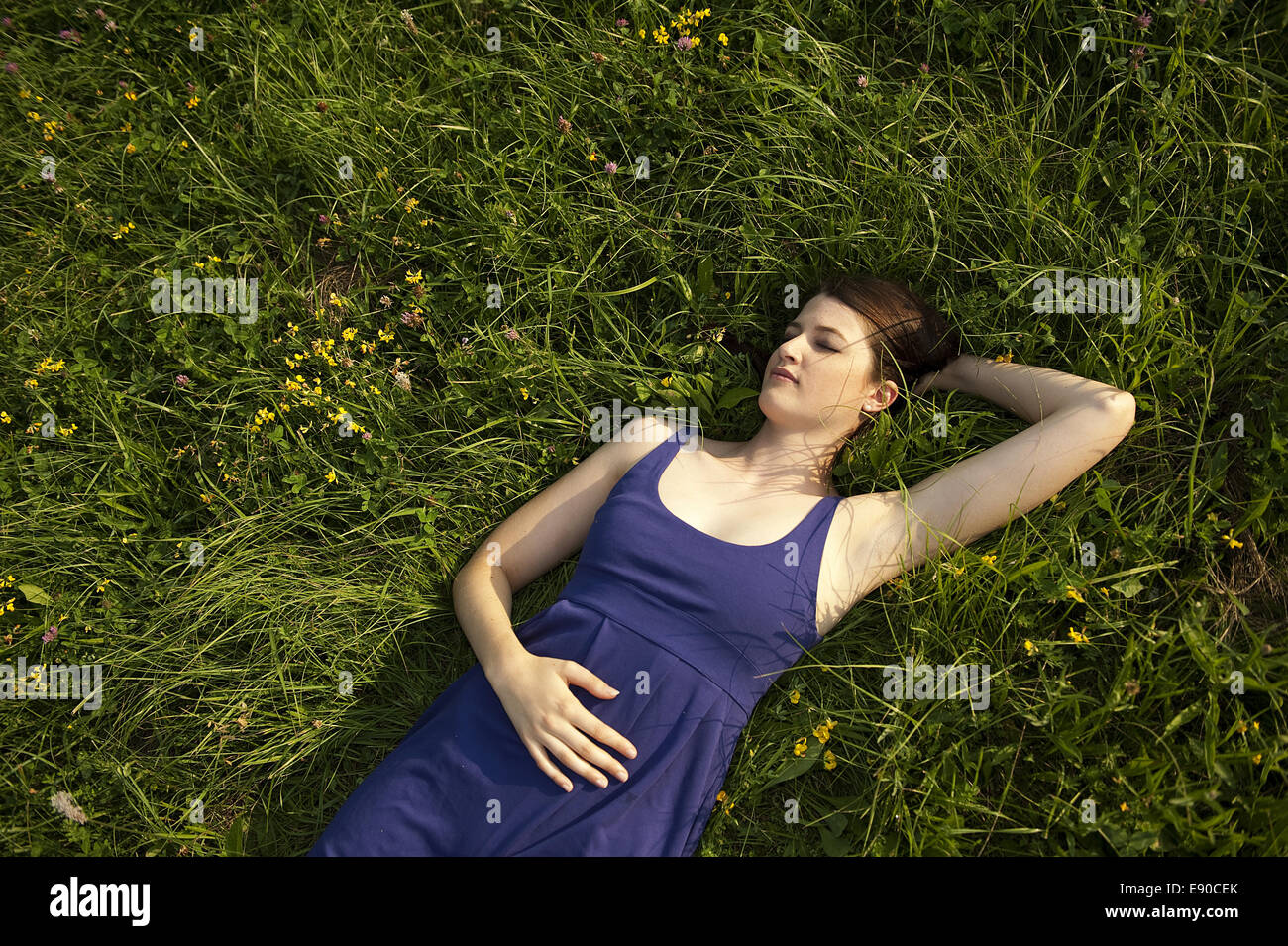 Young woman relaxing Stock Photo - Alamy