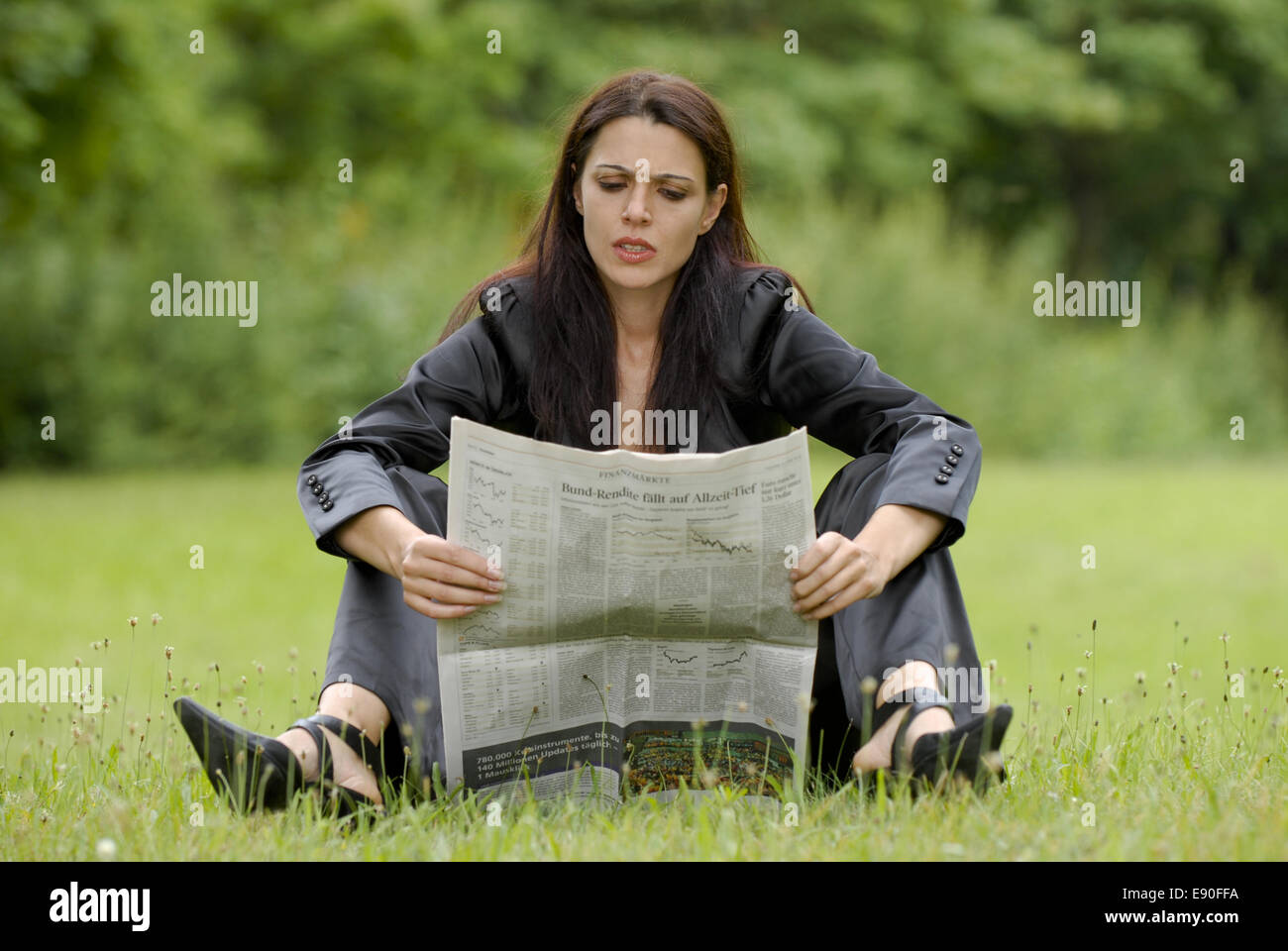 Woman Reads Newspaper High Resolution Stock Photography and Images - Alamy