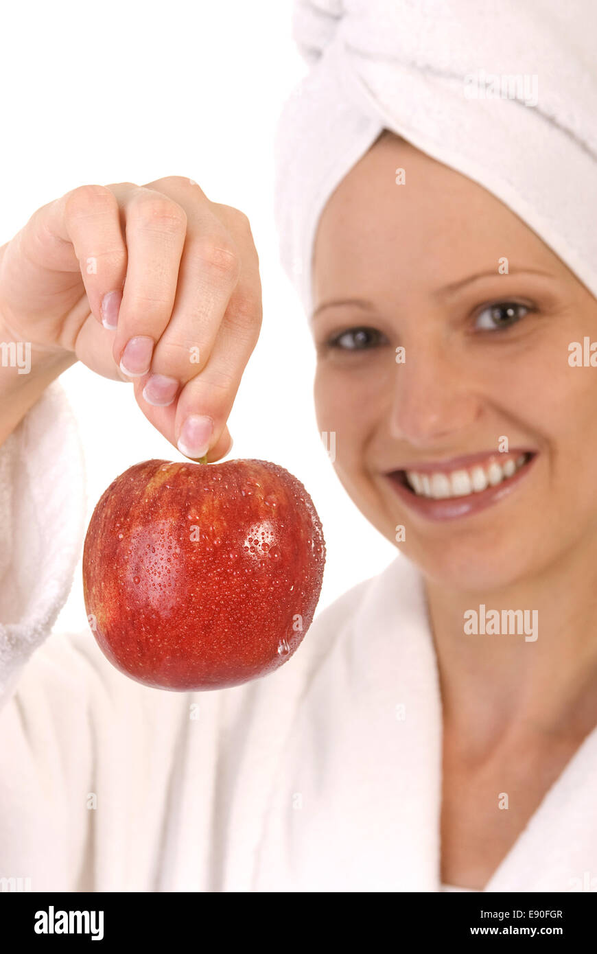 Woman holding apple in her hand Stock Photo - Alamy