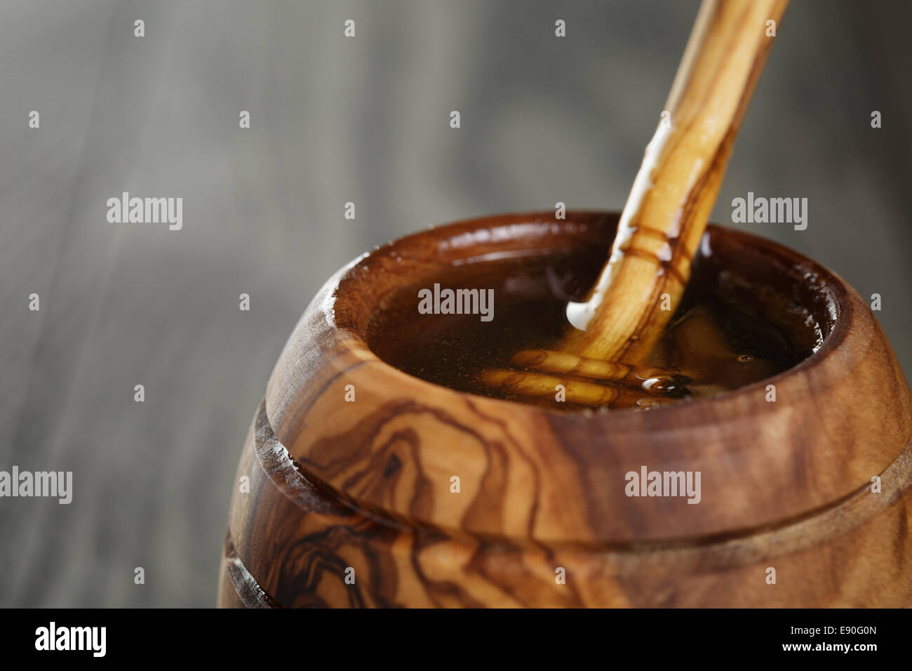 Honey jar dipper flowing hi-res stock photography and images - Alamy