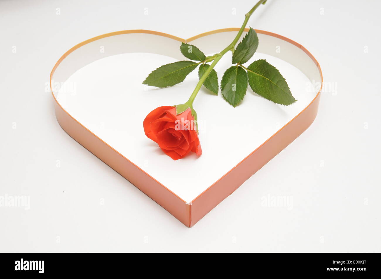 Red rose and heart Stock Photo - Alamy