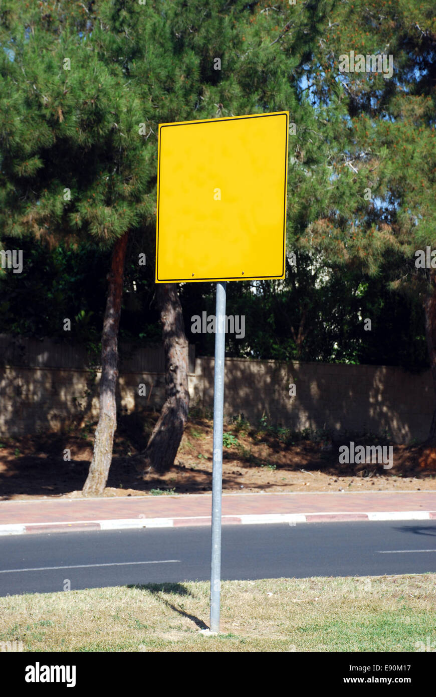 A Blank yellow Sign on a pole Stock Photo - Alamy