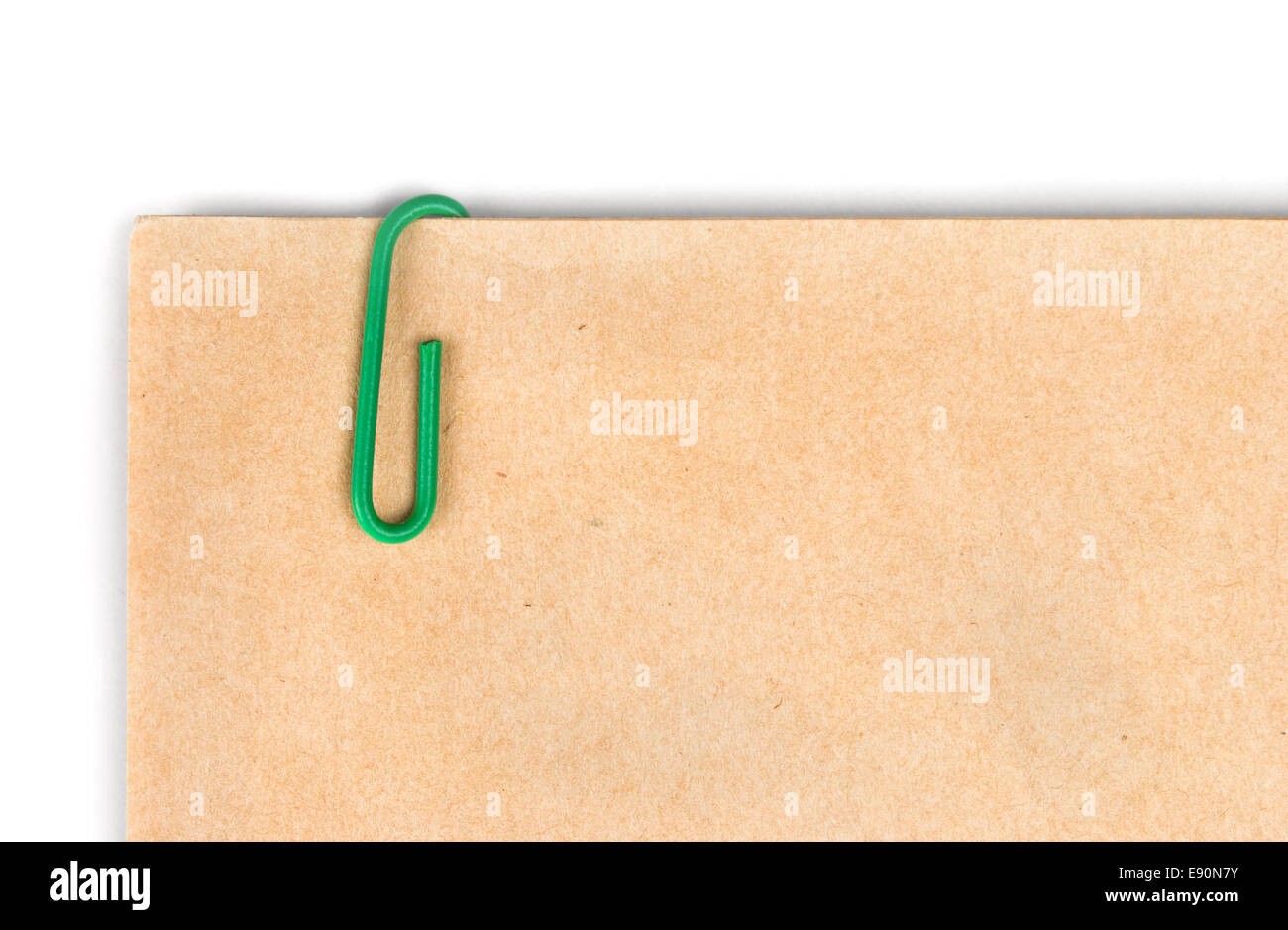 Yellow paper clip isolated Cut Out Stock Images & Pictures - Alamy