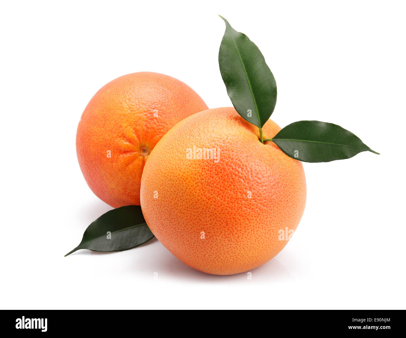 Grapefruit fruits with green leaf isolated Stock Photo - Alamy