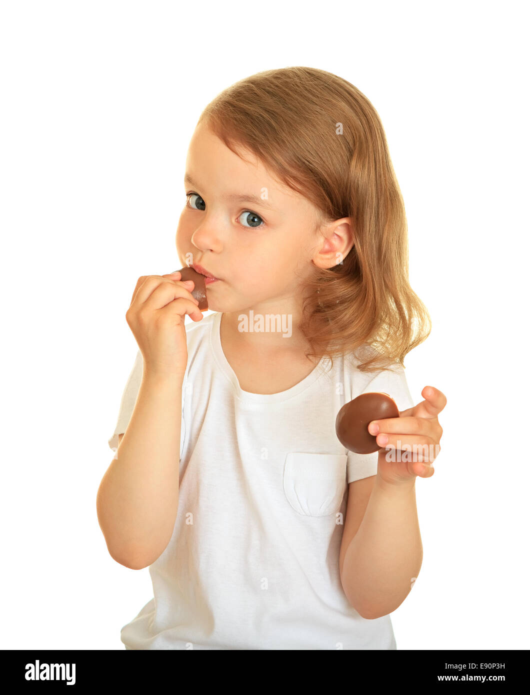 little girl eating chocolate Stock Photo - Alamy
