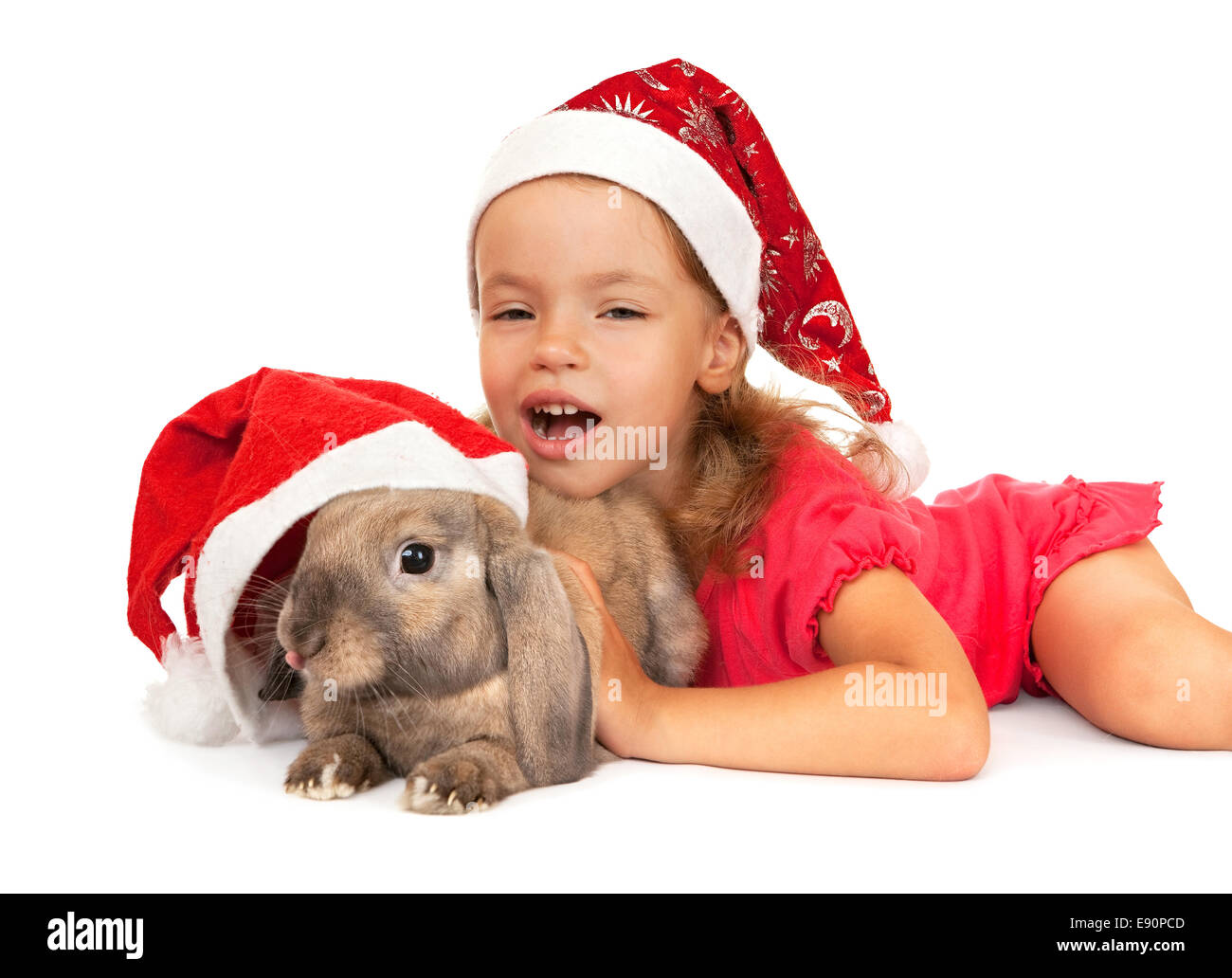 Child in the New Year hat with a rabbit Stock Photo - Alamy