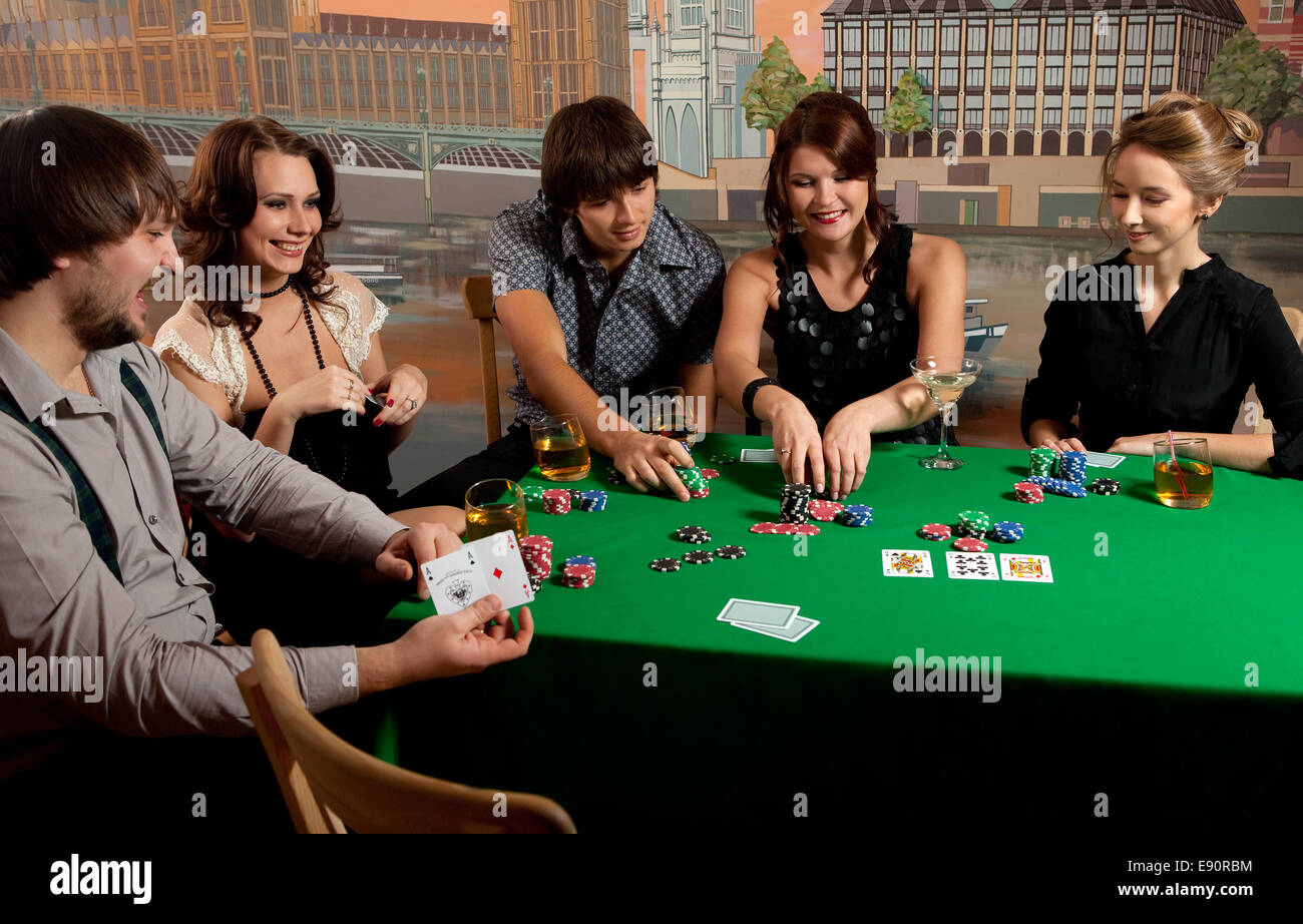 young people playing poker Stock Photo - Alamy